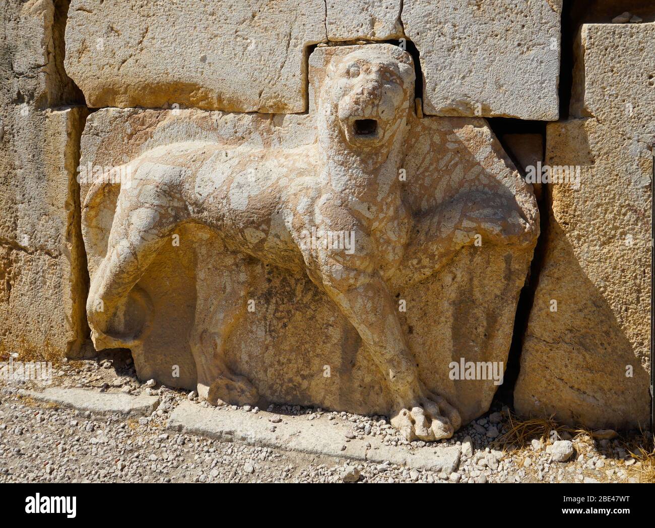 Jordan, village of Iraq al-Emir, stone sculpture of a lion. Placed on ...