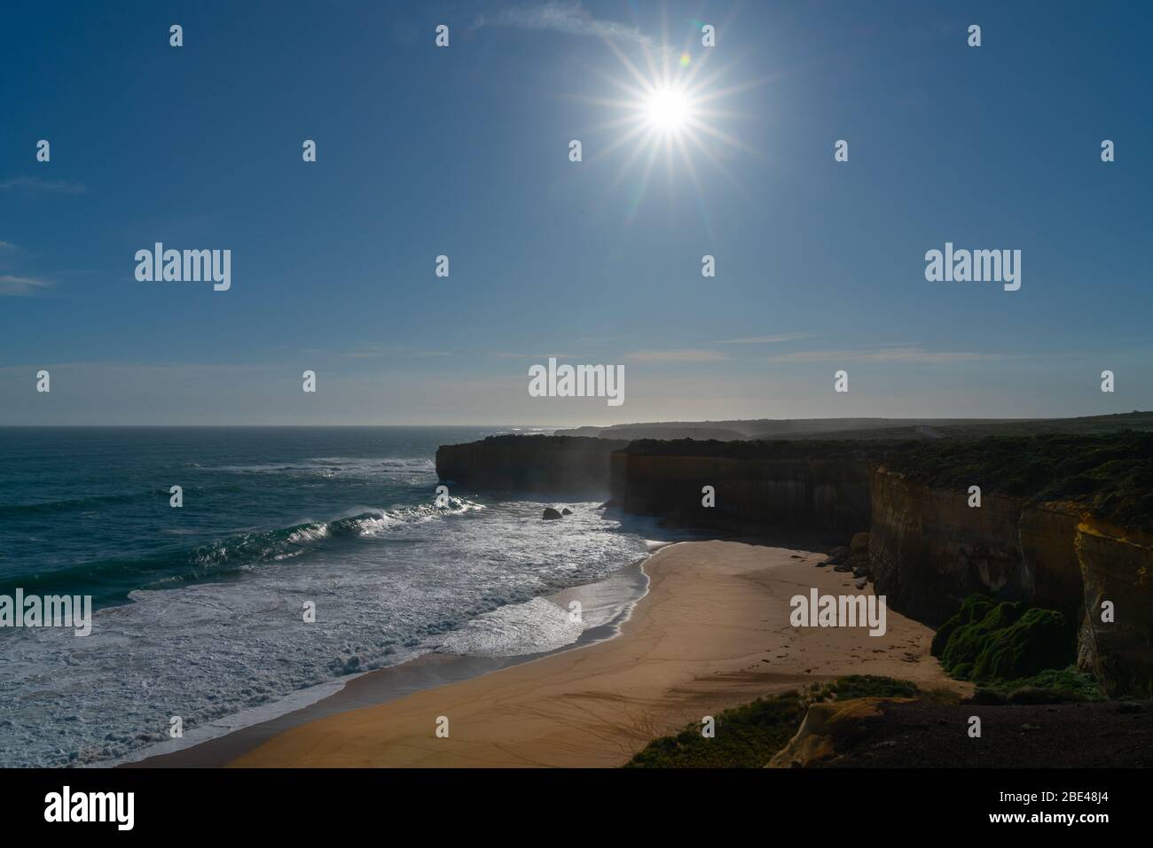 Sheer limestone cliff faces along Great Ocean Road coastal road trip ...