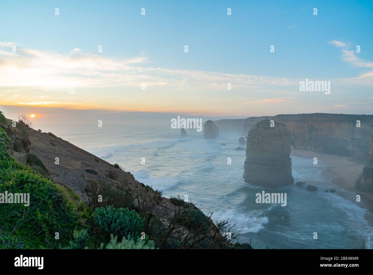 Twelve Apostles collection of limestone stacks at sunset along Great ...