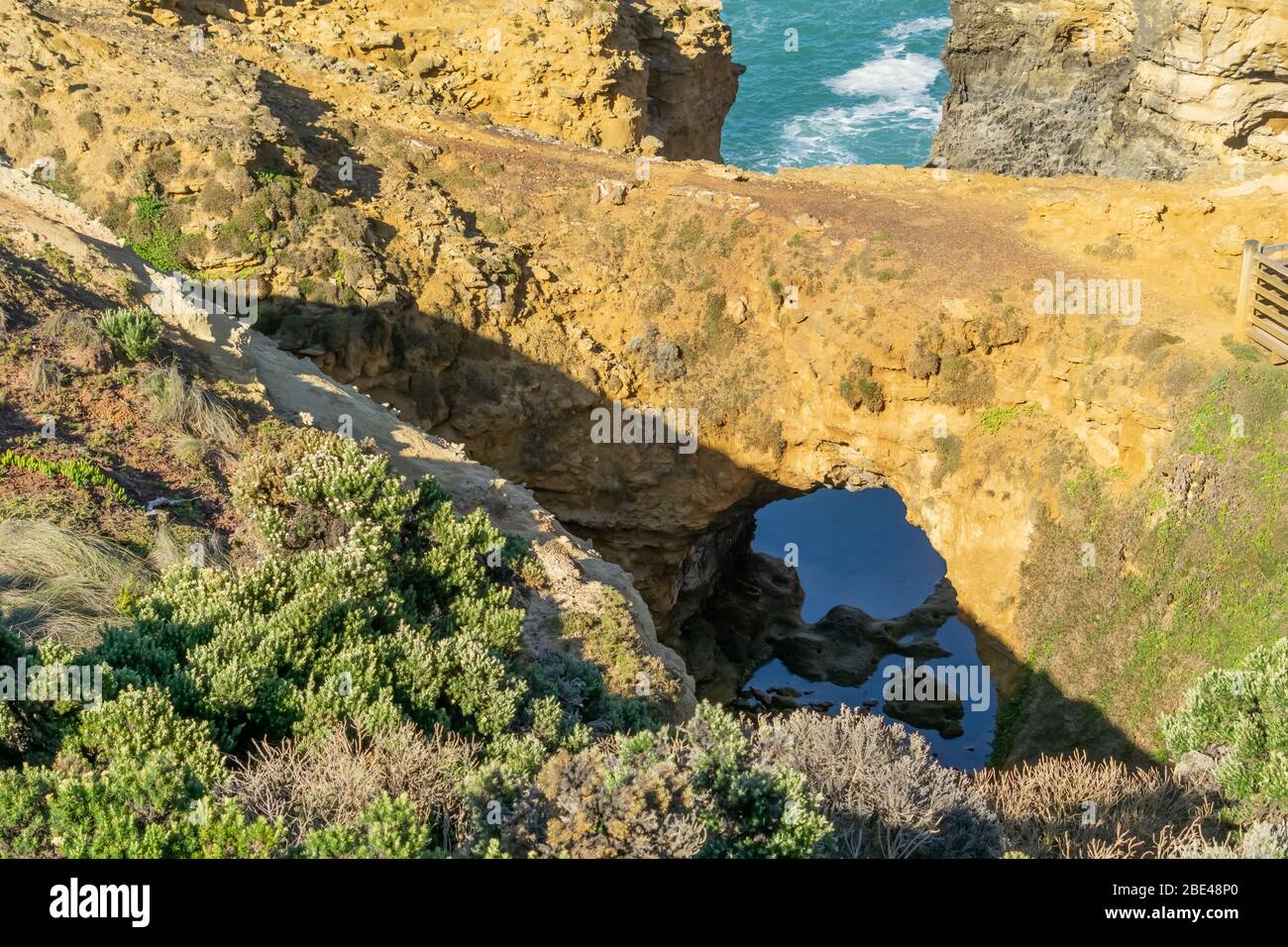 The natural arch and bridge of The Grotto geological formation that ...