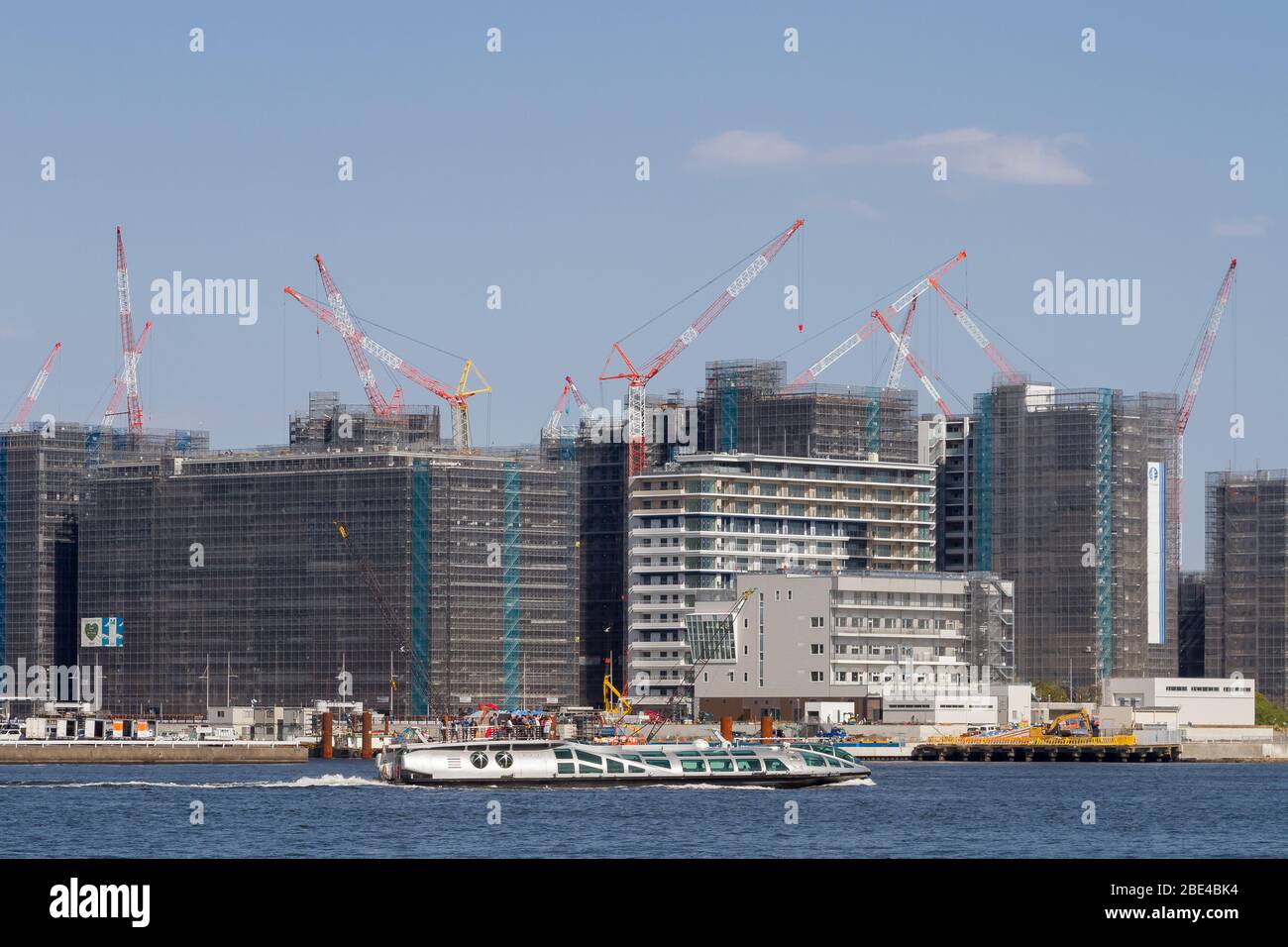 A distinctive Himiko tour boats crossing in front of the construction ...
