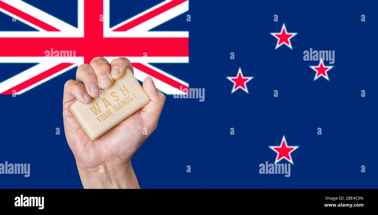 Caucasian male hand holdinga bar of soap with words: Wash Your Hands ...