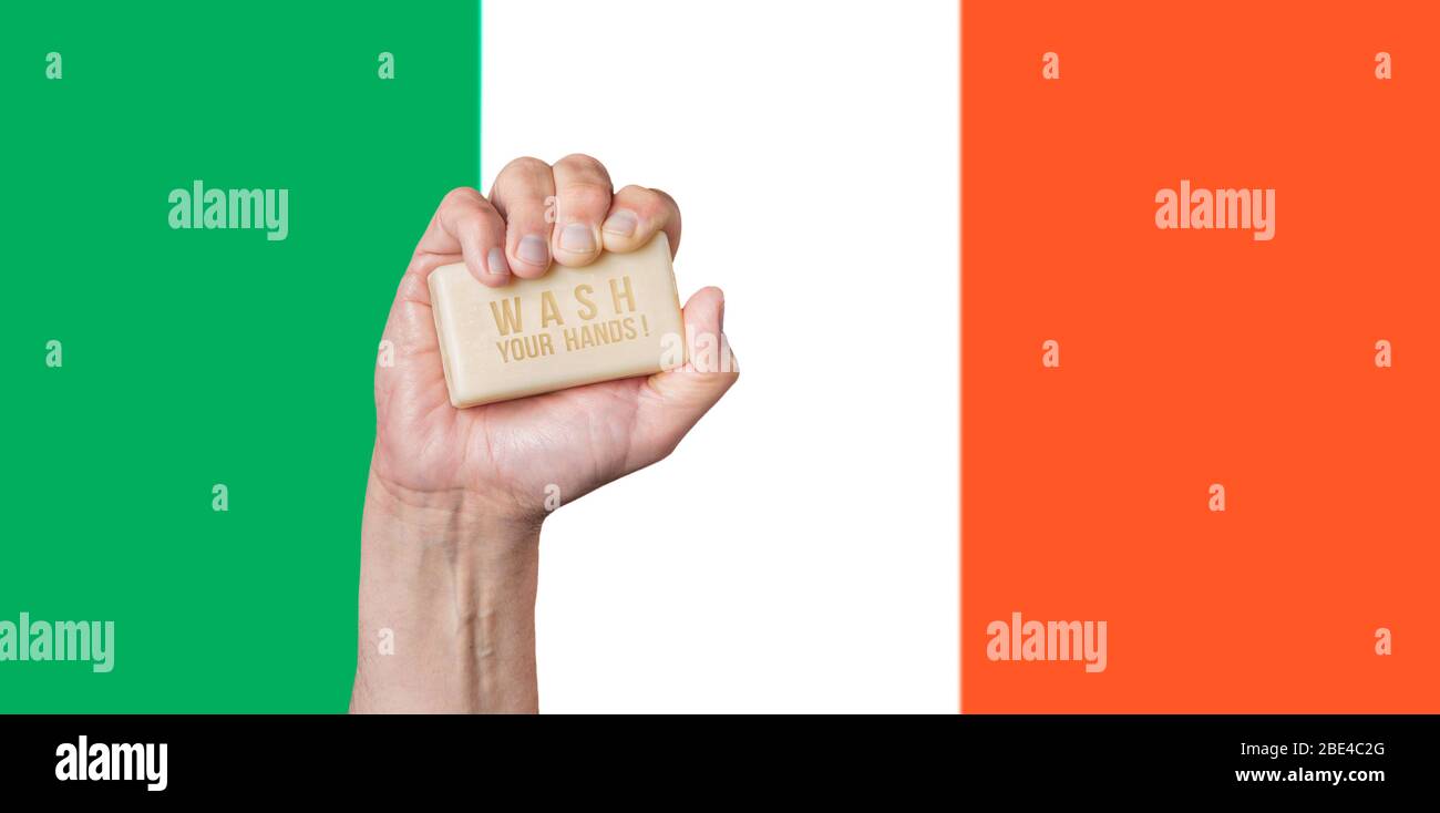 Caucasian male hand holding a bar of soap with words: Wash Your Hands ...