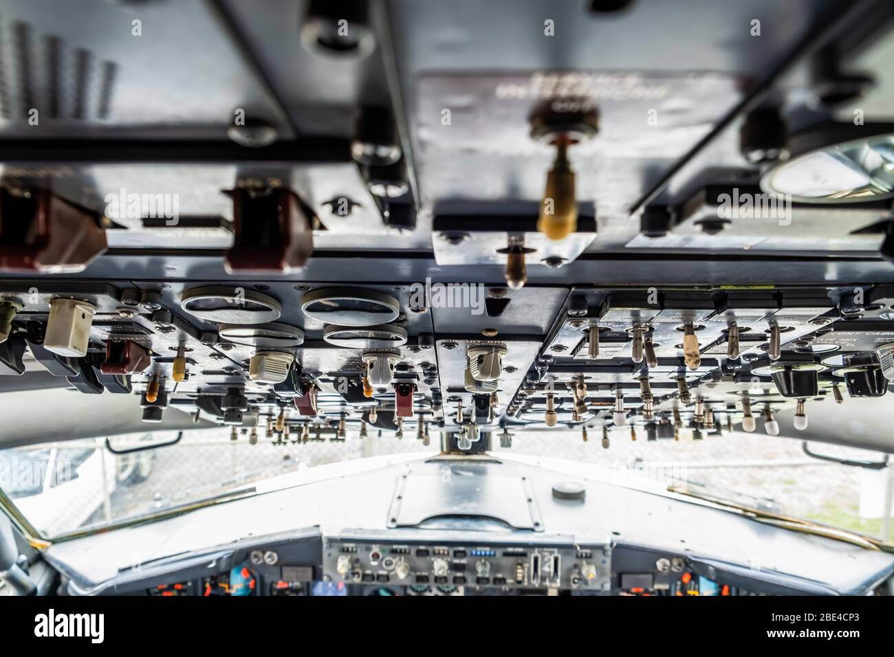 Many switches on aircraft cockpit ceiling in shallow focus Stock Photo ...