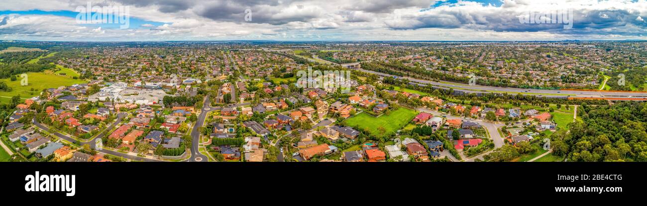 Wide aerial panorama of Mulgrave suburb and Eastlink highway on ...