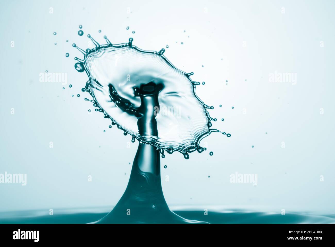Water splash crown. Drop collision Stock Photo - Alamy