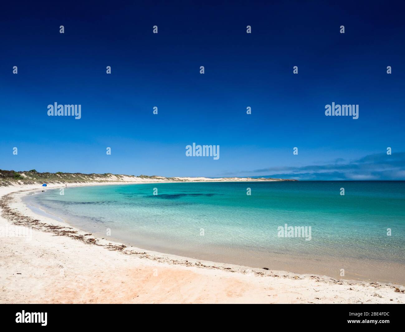 Curving white sand beach and bay at Gnylmarung, Dampier Peninsula ...