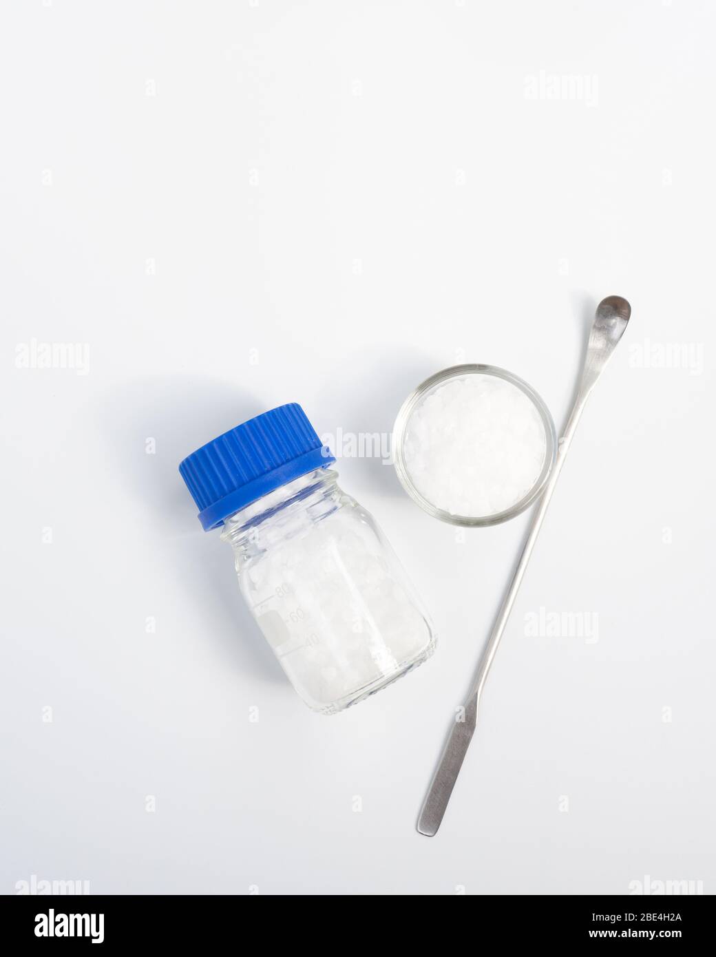 Microcrystalline wax in glass container. Chemical ingredient for ...