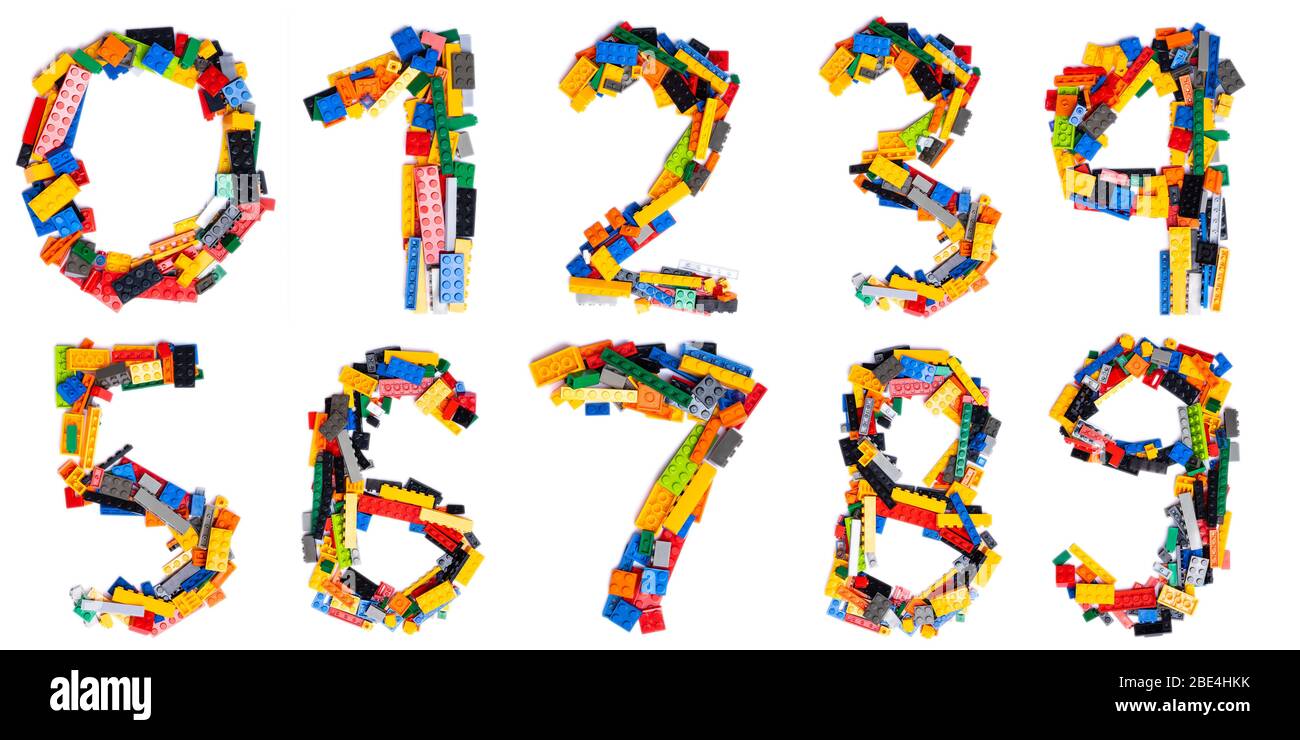 Arabic numerals from multi-colored children's plastic constructor on a ...