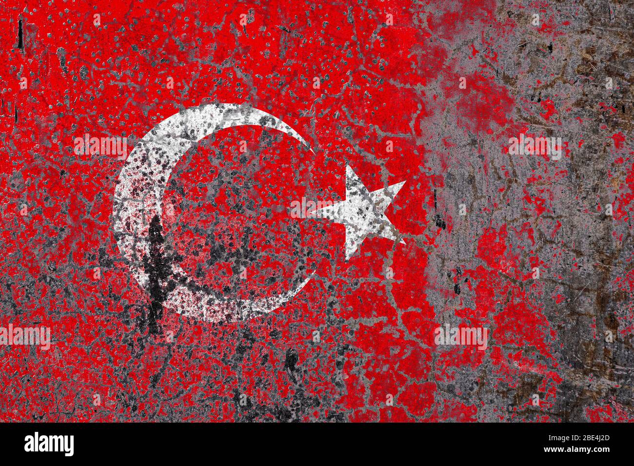 National flag of Turkey on old peeling wall background.The concept of ...