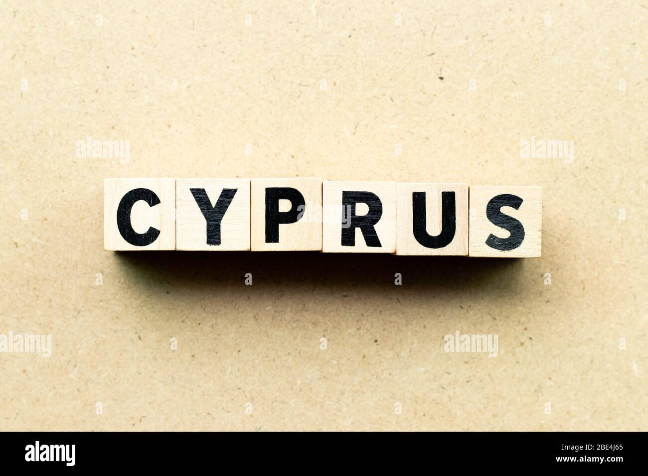 Alphabet letter block in word cyprus on wood background Stock Photo - Alamy