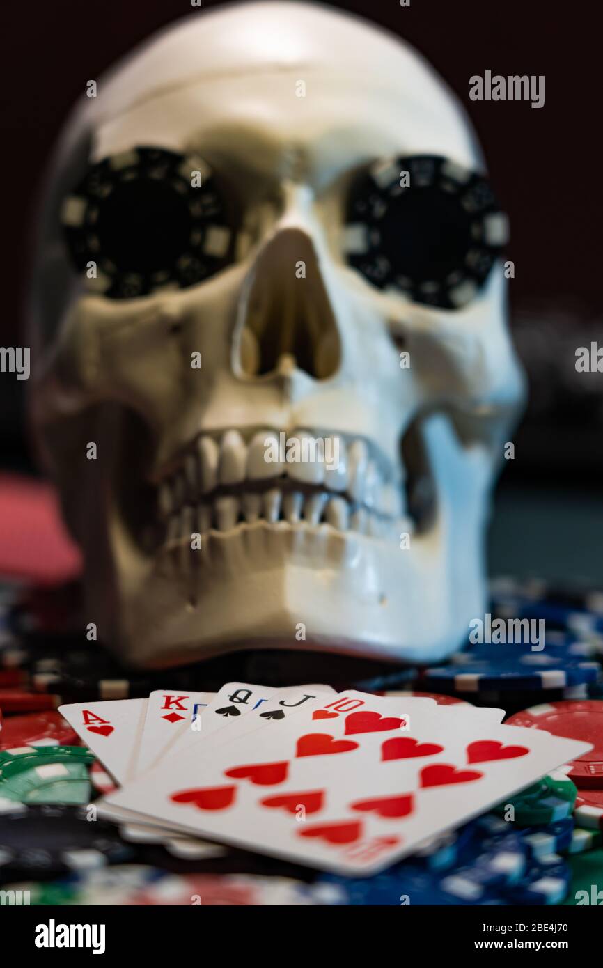 Human skull at Black Jack table Stock Photo - Alamy