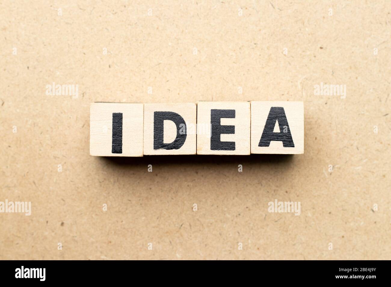 Letter block in word idea on wood background Stock Photo - Alamy