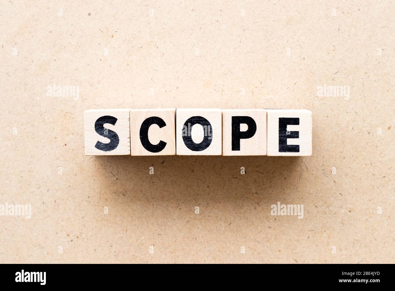 Letter block in word scope on wood background Stock Photo - Alamy