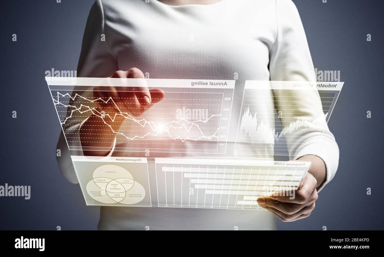 Businesswoman hands using virtual interface Stock Photo - Alamy