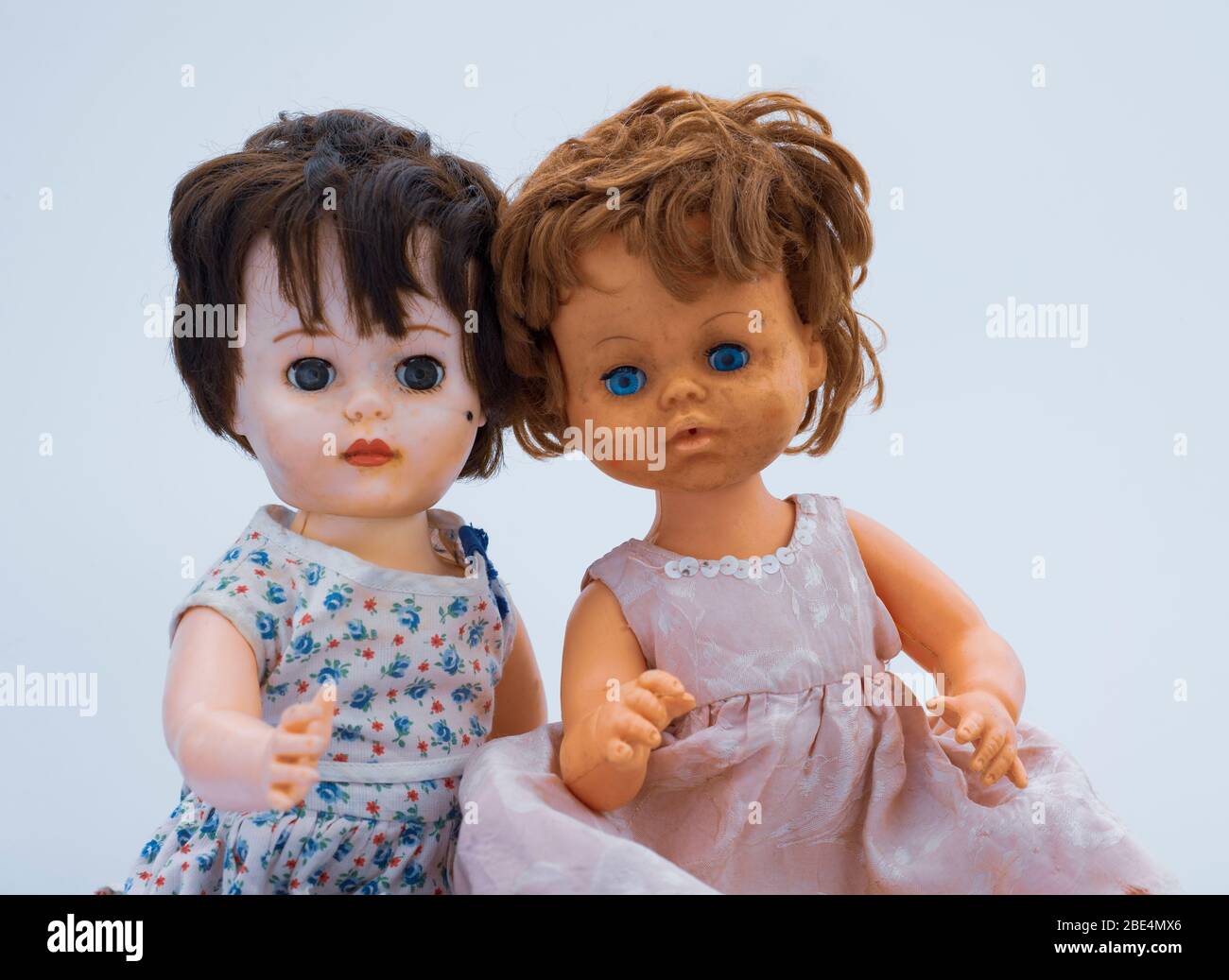 Portrait of two old female dolls sitting Stock Photo - Alamy