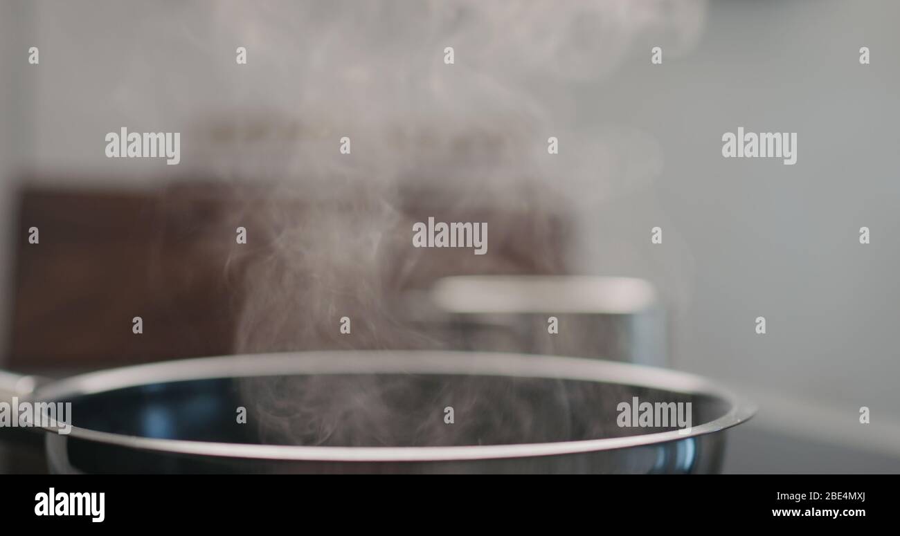 Steam rising from pan hi-res stock photography and images - Alamy