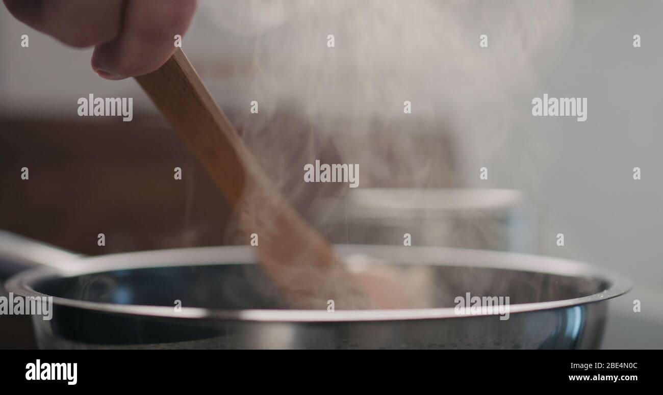 Steam in frying pan hi-res stock photography and images - Alamy