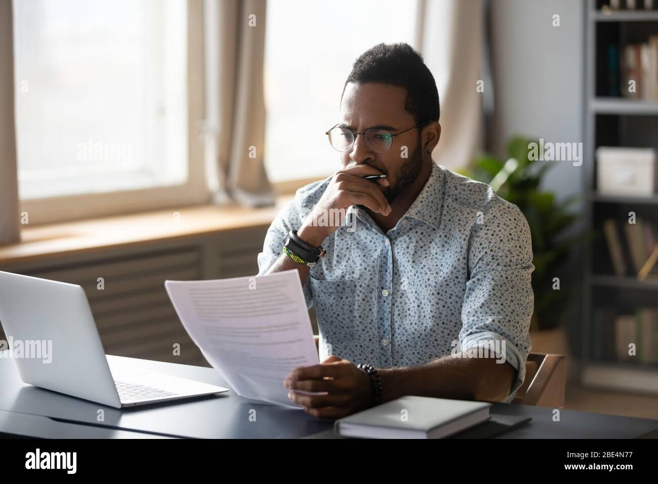 Reviewing report hi-res stock photography and images - Alamy