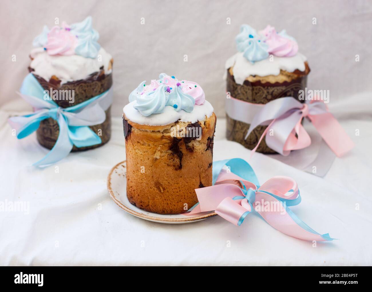 Traditional orthodox easter cake kulich with festive blue, purple and ...