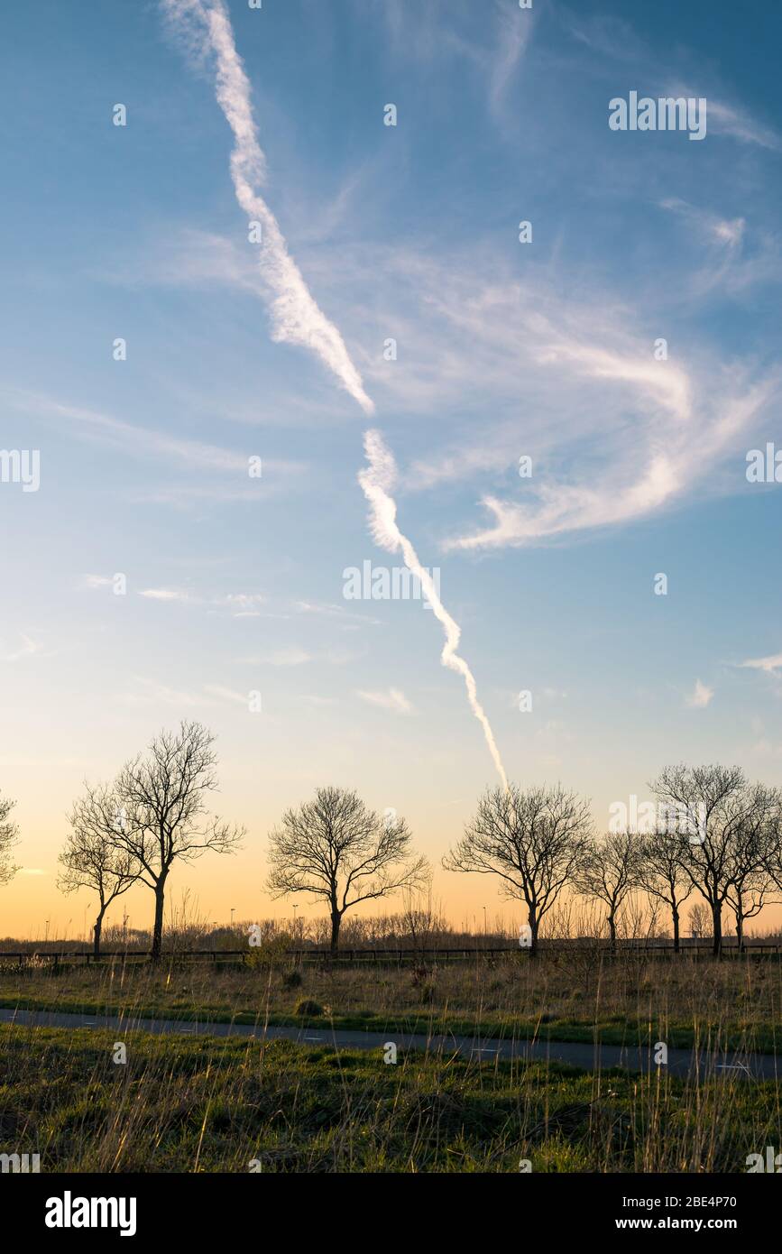 Vertical contrail hi-res stock photography and images - Alamy