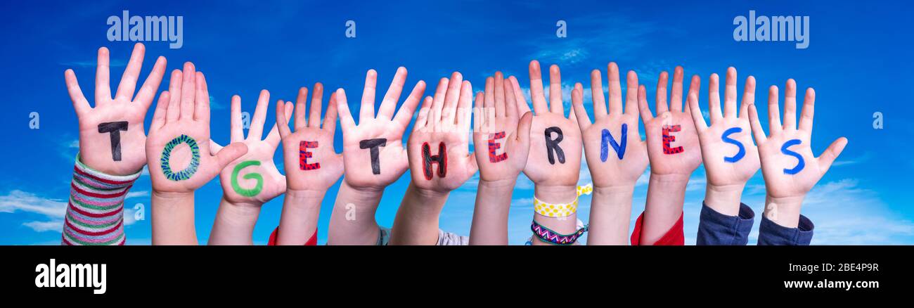 Children Hands Building Word Togetherness, Blue Sky Stock Photo - Alamy