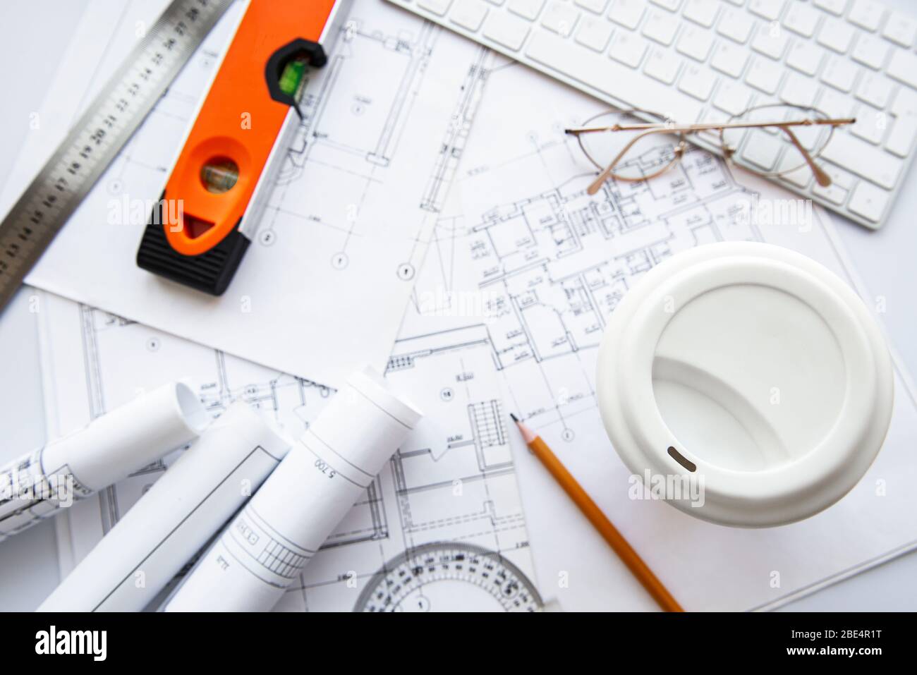 Architect workplace top view. Architectural project, blueprints ...