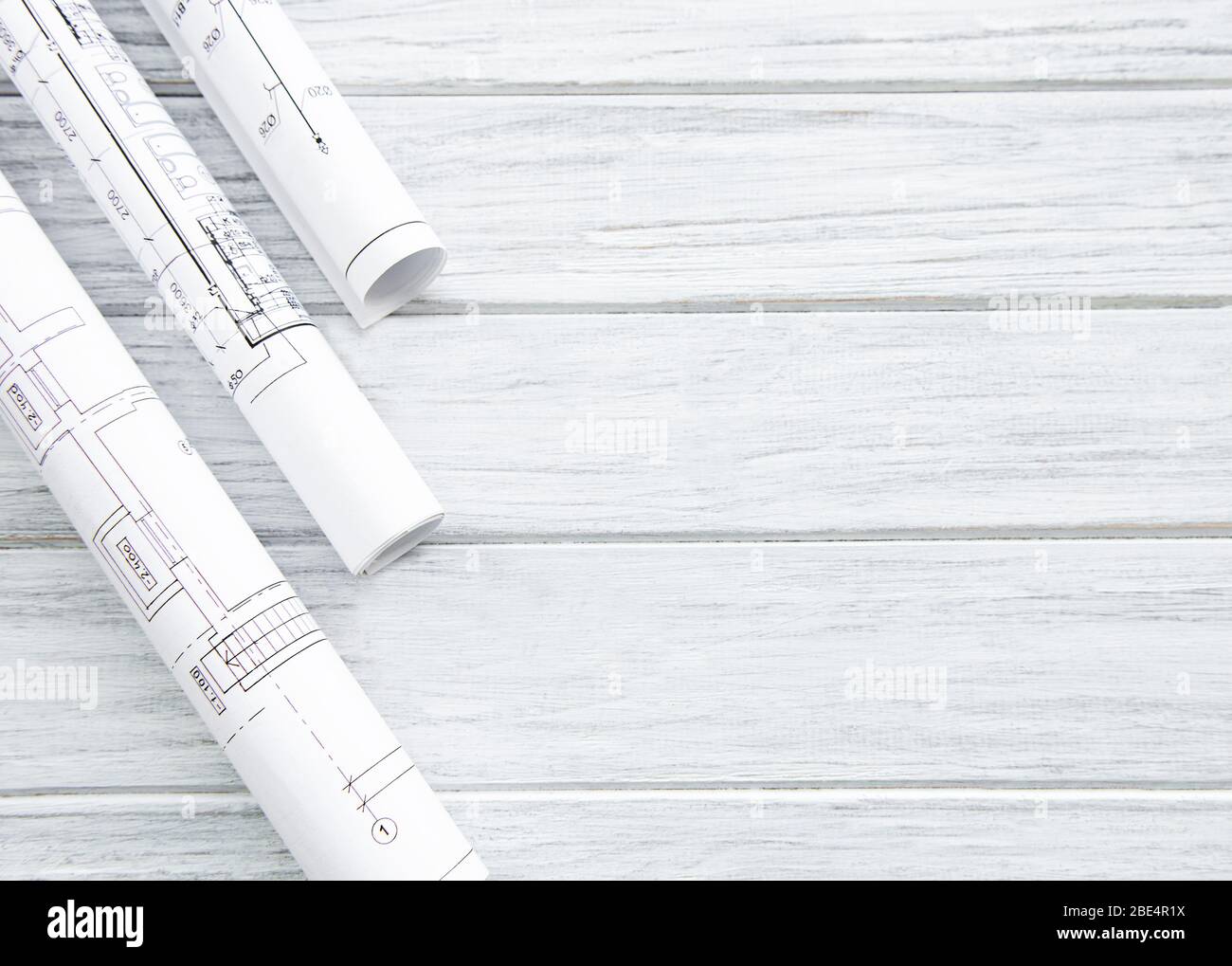 Architect workplace top view. Architectural project, blueprints ...