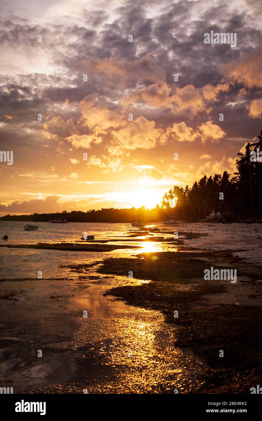Beautiful sunset at a beach in Bohol Island, Phillippines Stock Photo ...