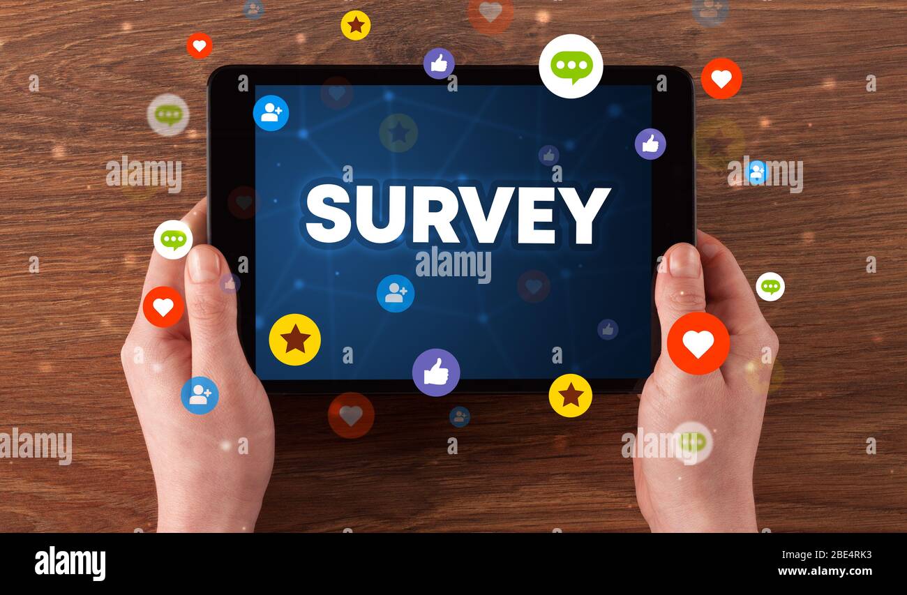 Close-up of a touchscreen with SURVEY inscription, social networking ...