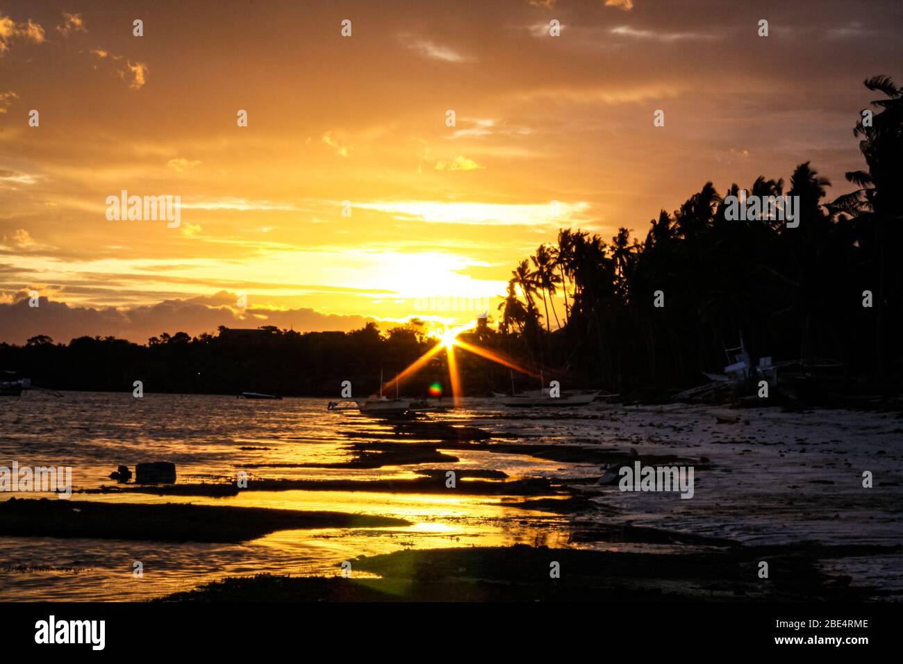 Beautiful sunset at a beach in Bohol Island, Phillippines Stock Photo ...