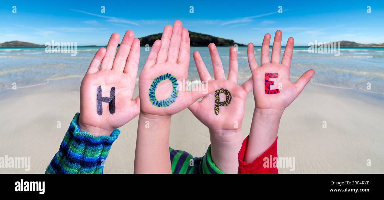 Children Hands Building Word Hope, Ocean Background Stock Photo - Alamy