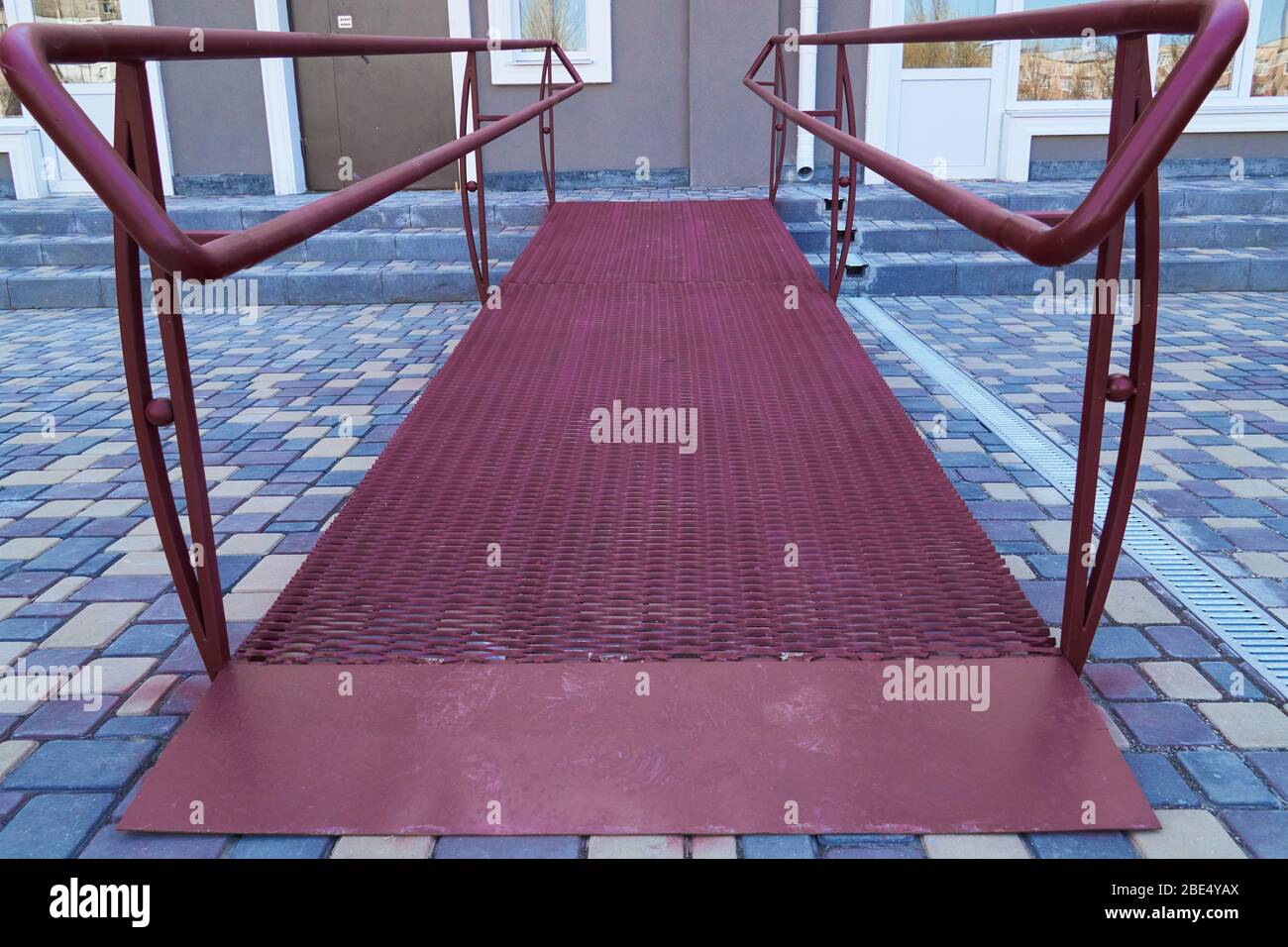 Wheelchair access ramp for entrance of residential multistory building ...