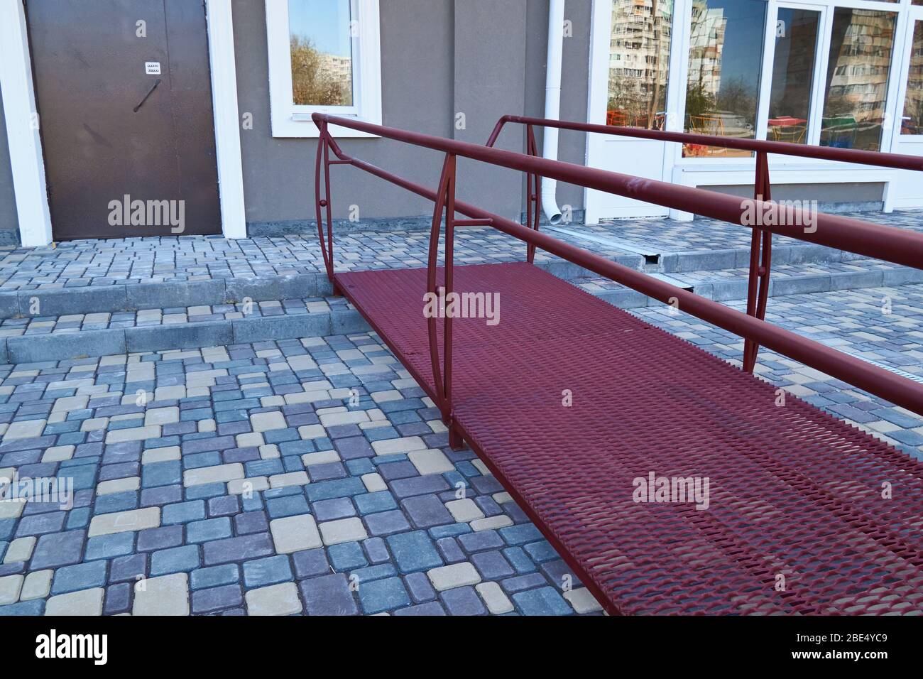Wheelchair access ramp for entrance of residential multistory building ...