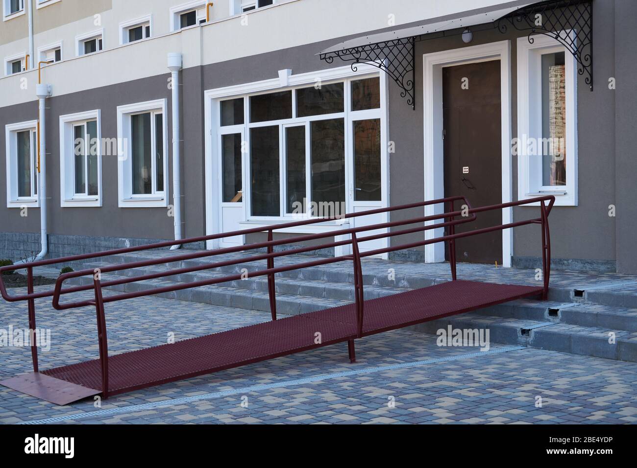 Wheelchair access ramp for entrance of residential multistory building ...