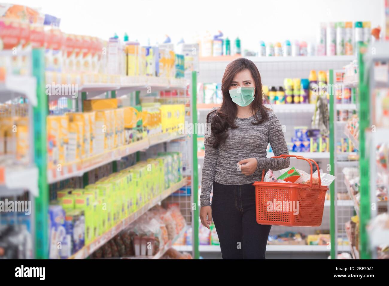 portrait of happy customer shopping at groceries store Stock Photo - Alamy
