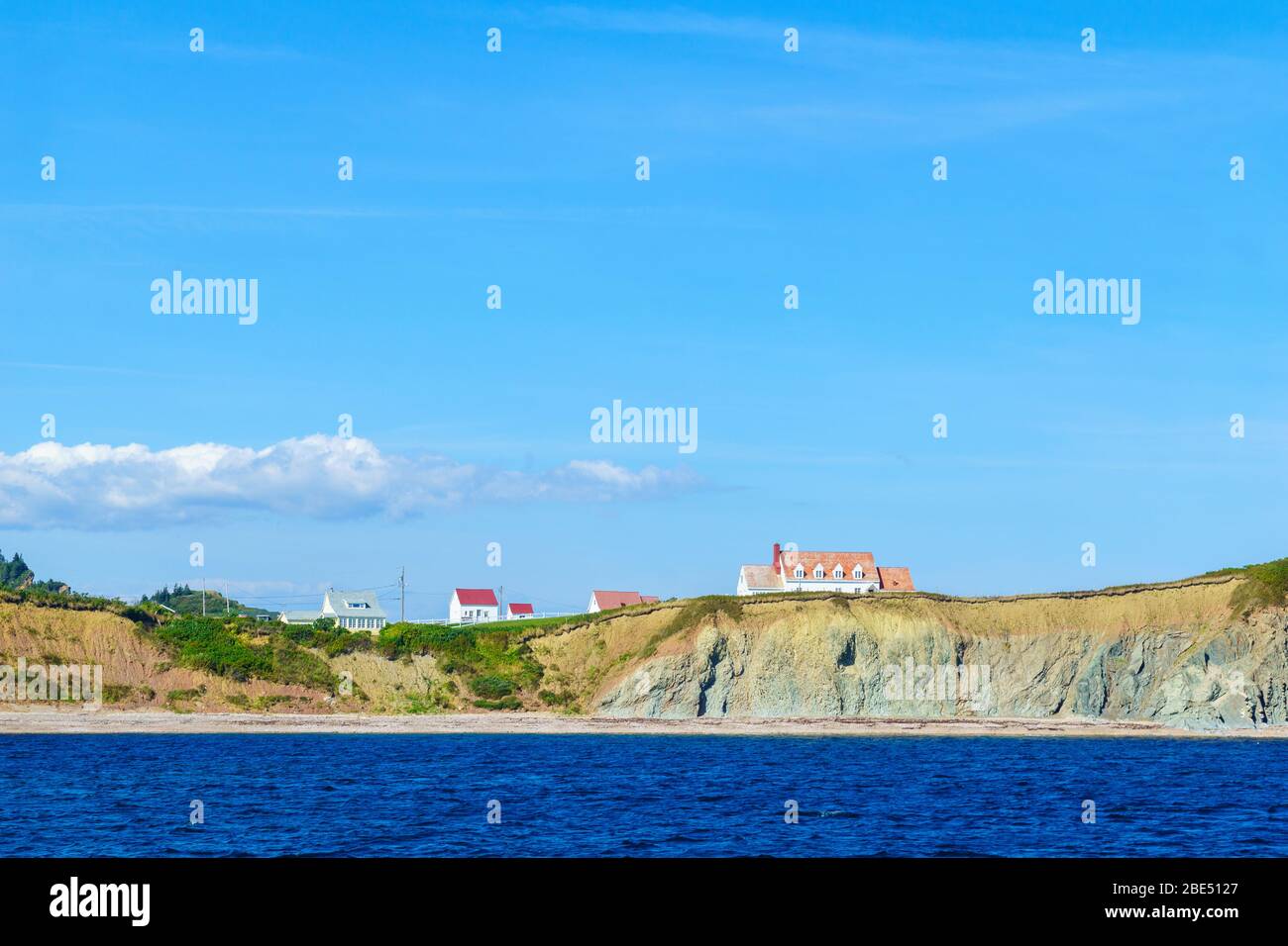 View of the Perce village from the sea, at the tip of Gaspe Peninsula ...