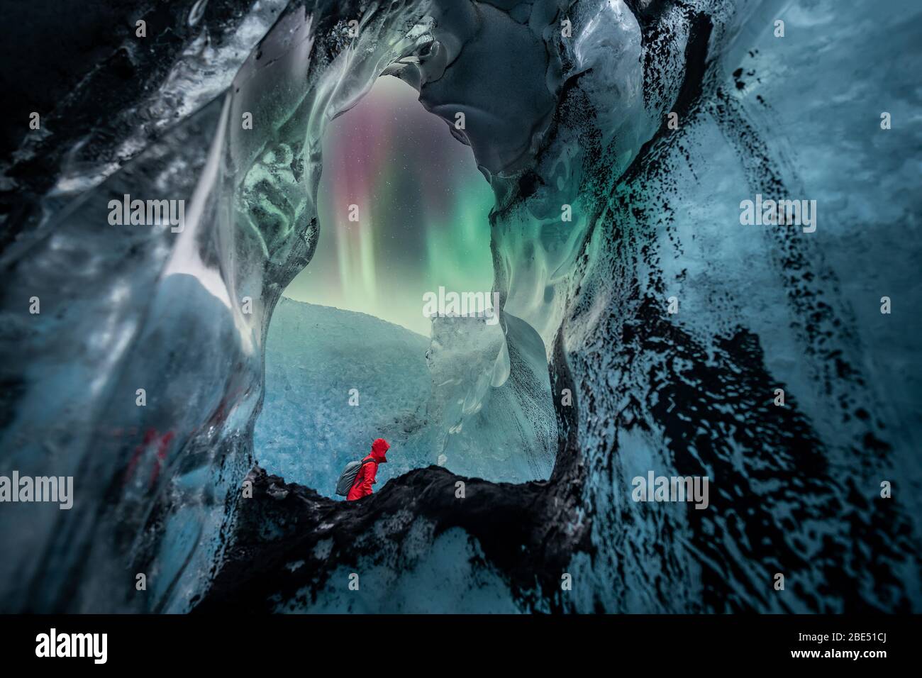 Northern lights aurora borealis over glacier ice cave Stock Photo - Alamy