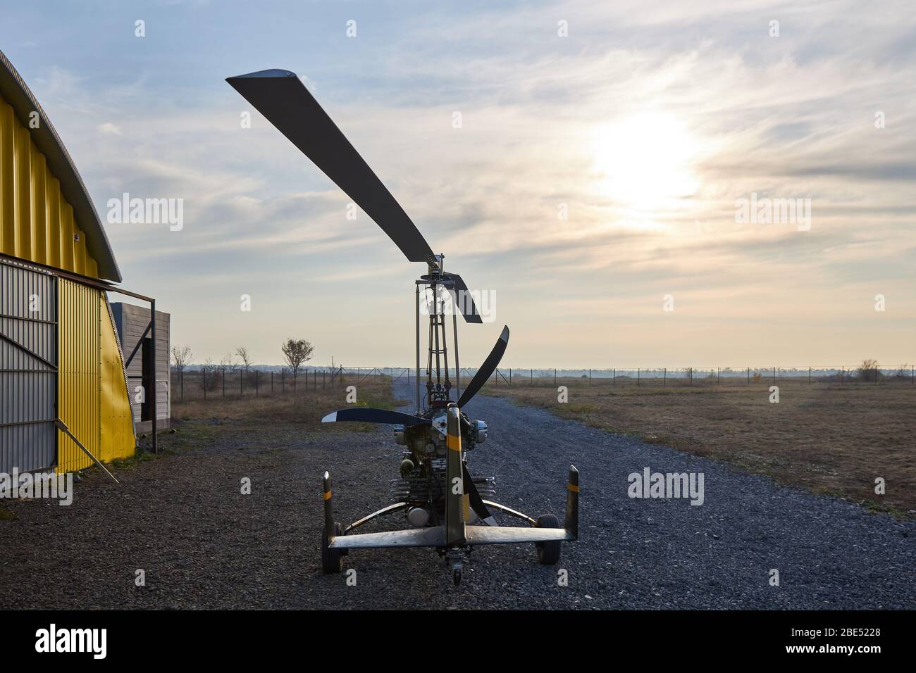 Single place ultralight homemade gyroplane stands at the airport near ...
