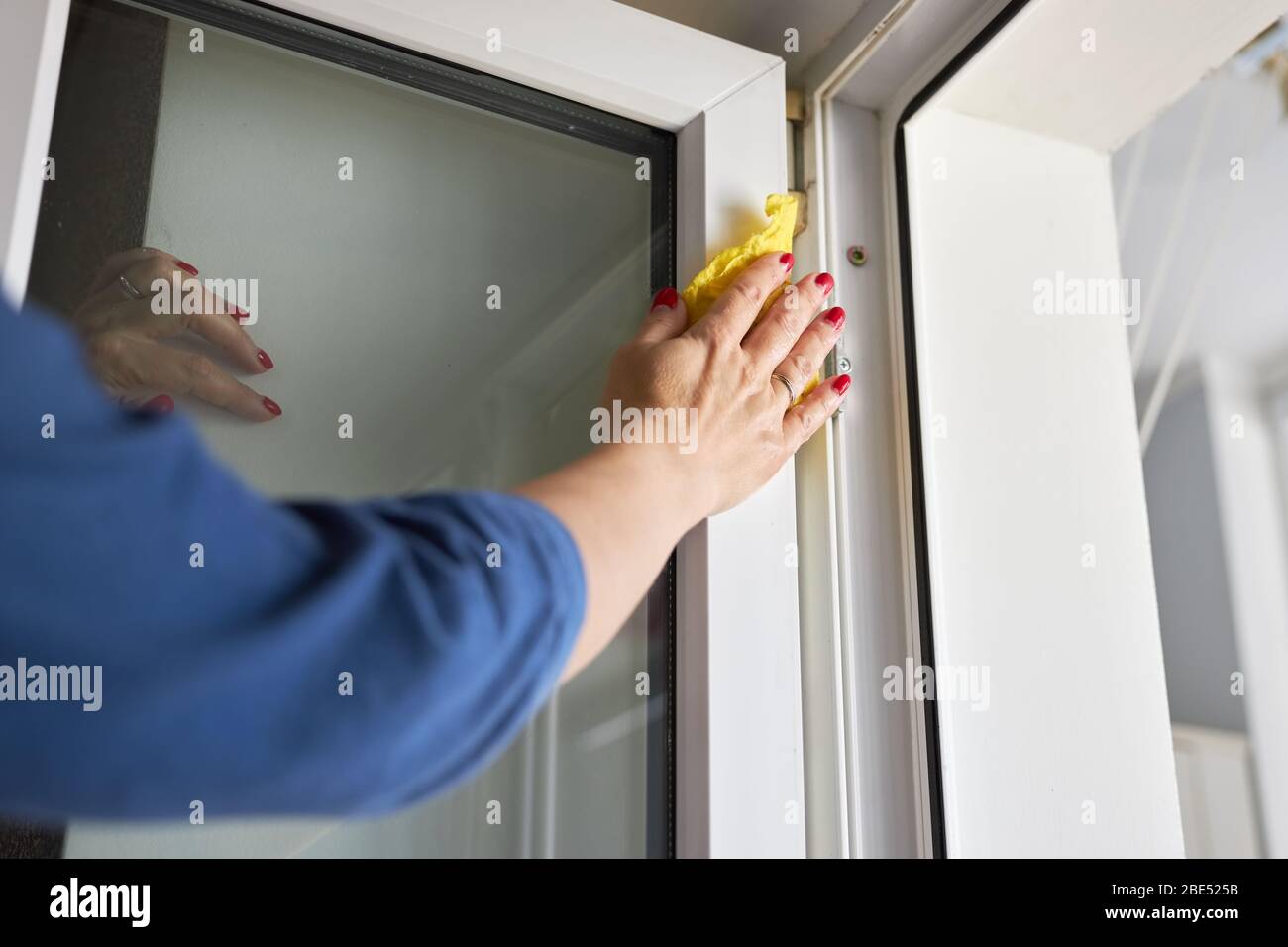 Woman open window home clean hi-res stock photography and images - Alamy