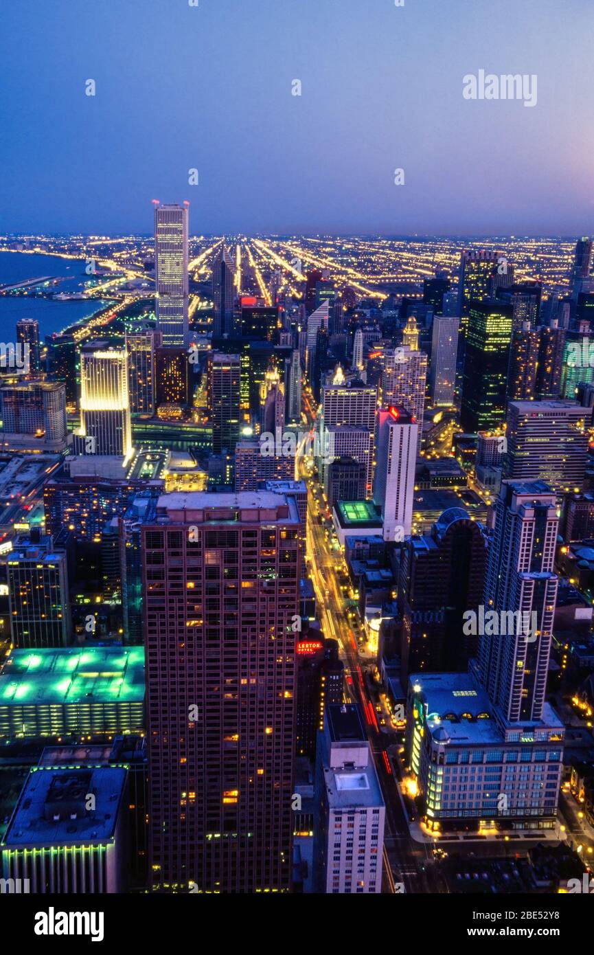 Aerial view of Chicago lights, skyscrapers and skyline at dusk taken ...