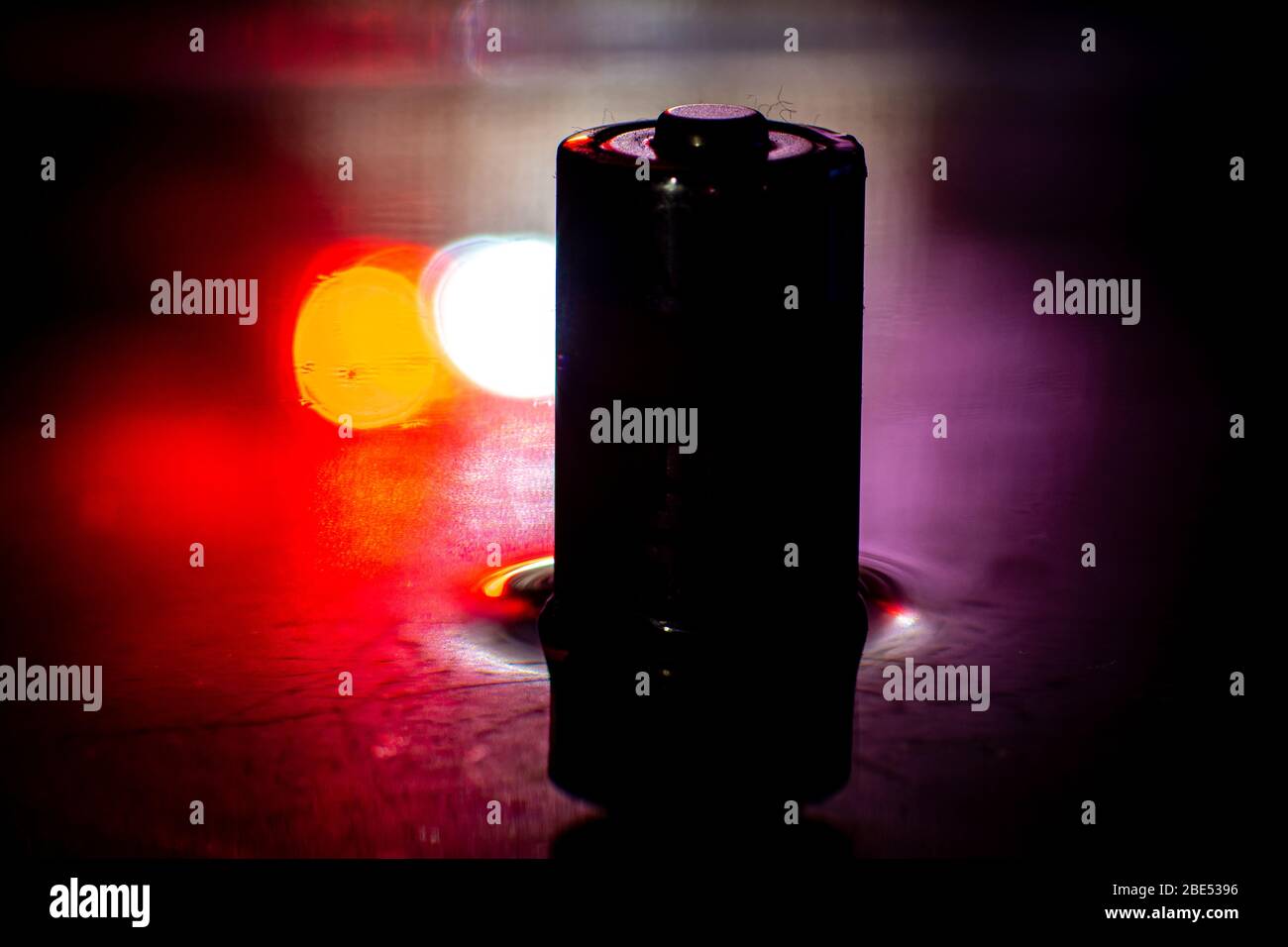 purple splash in to the water Stock Photo - Alamy
