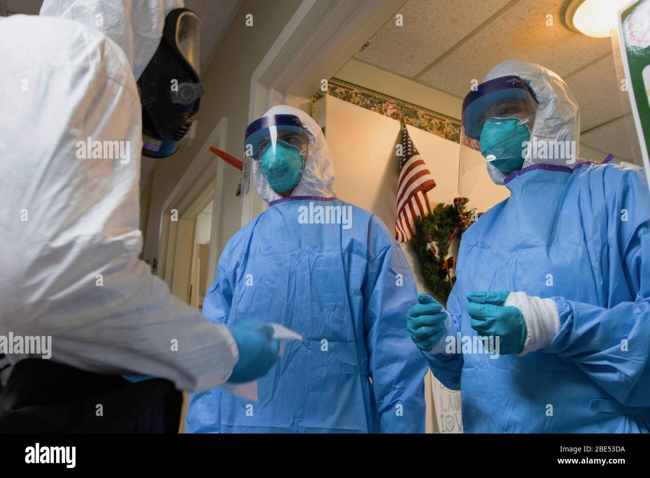 LITTLETON, USA - 03 April 2020 – Soldiers wipe off their face masks ...