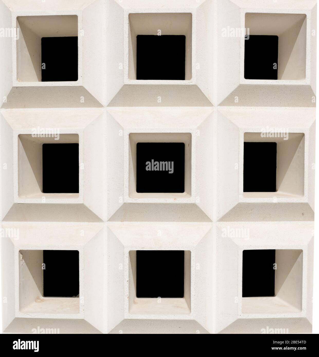 Square openings in a curved concrete wall Stock Photo - Alamy