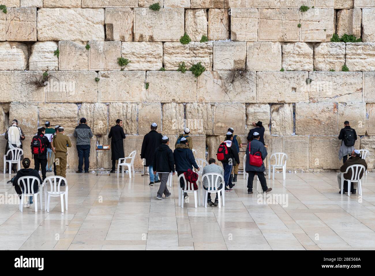 People praying and grieving at the Western Wall in Jerusalem Stock ...