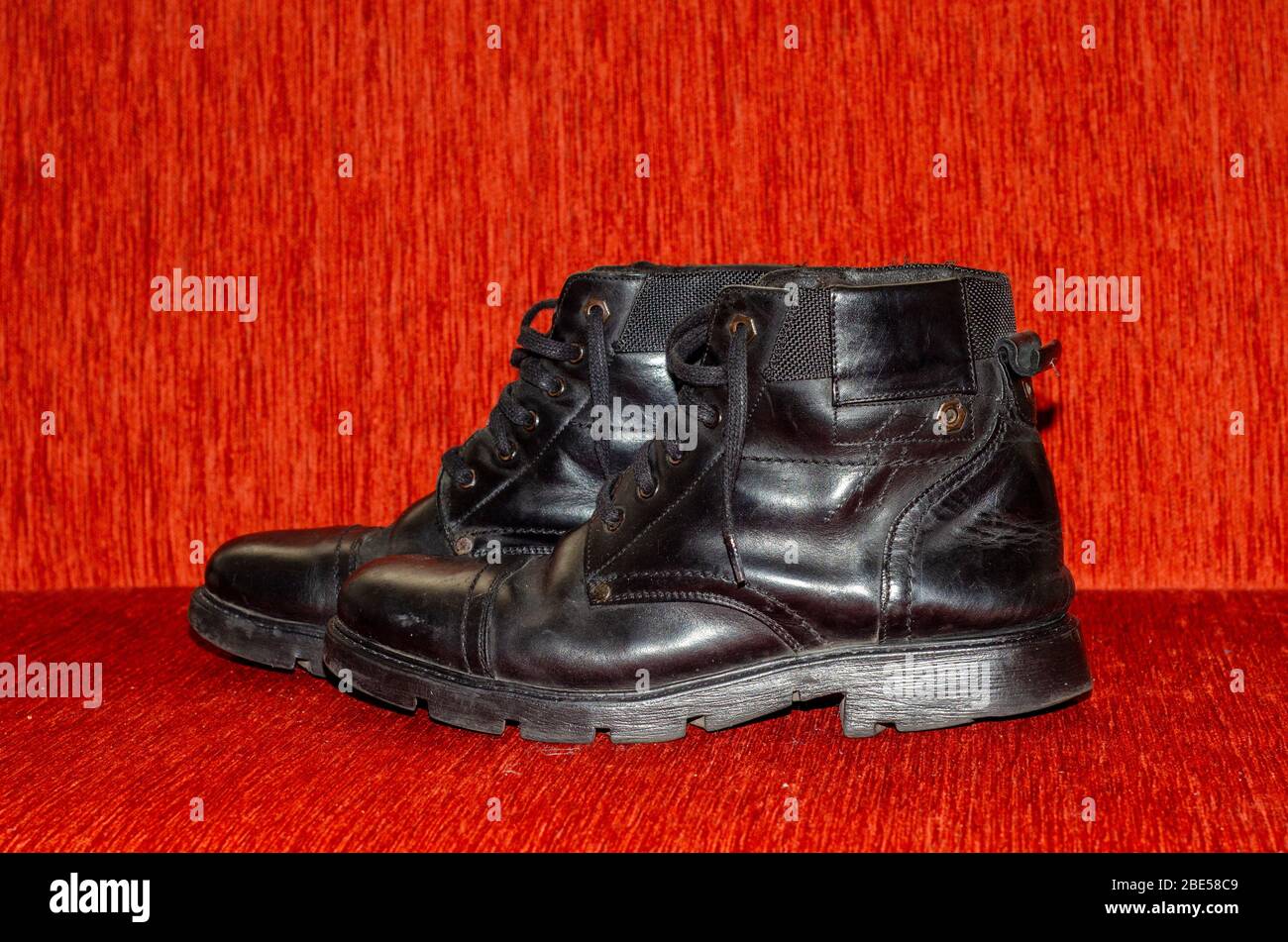 Old Black Leather Boots, Vintage Stock Photo - Alamy