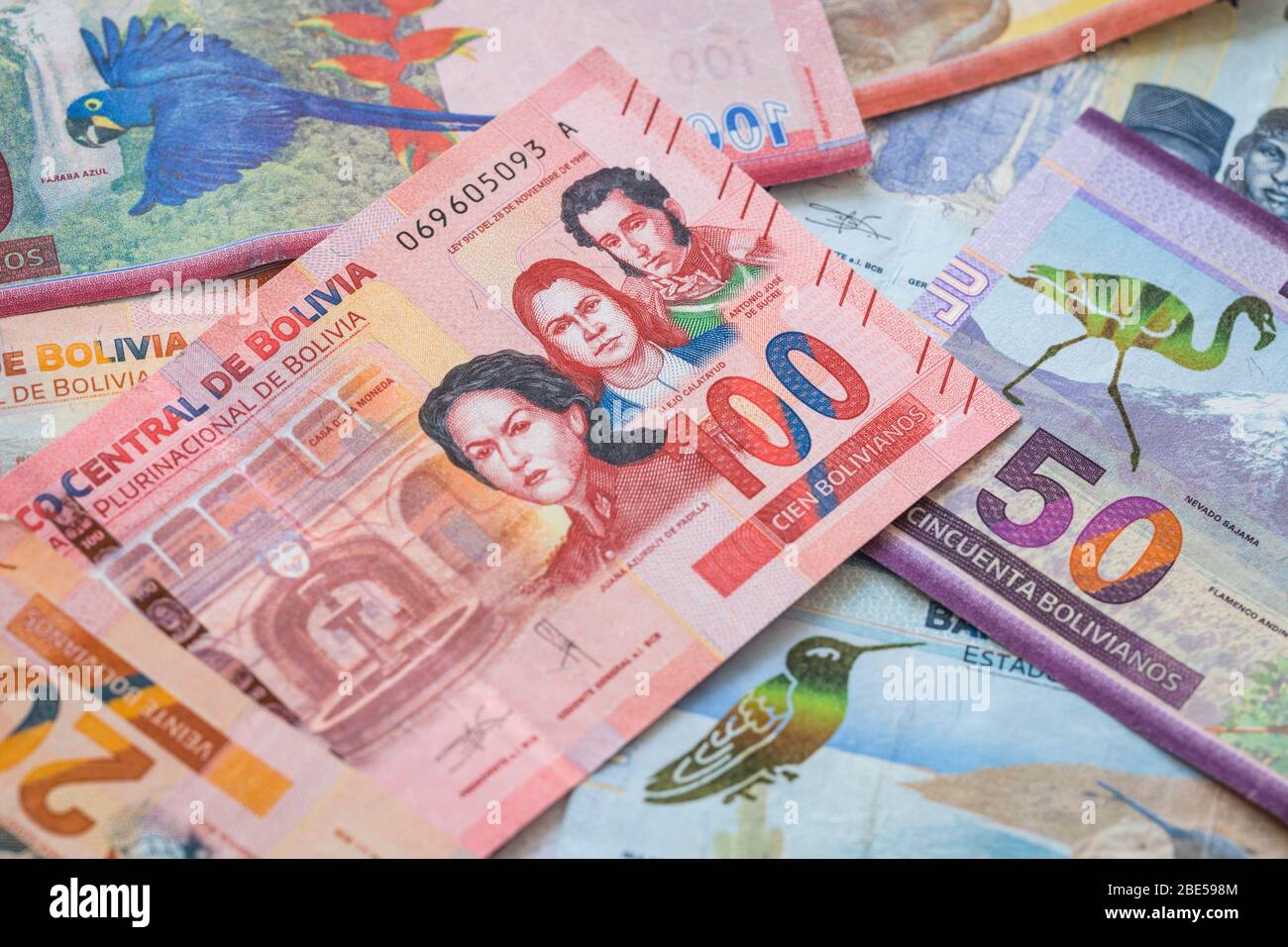 Bolivian money. Various banknotes spread out on a table Stock Photo - Alamy