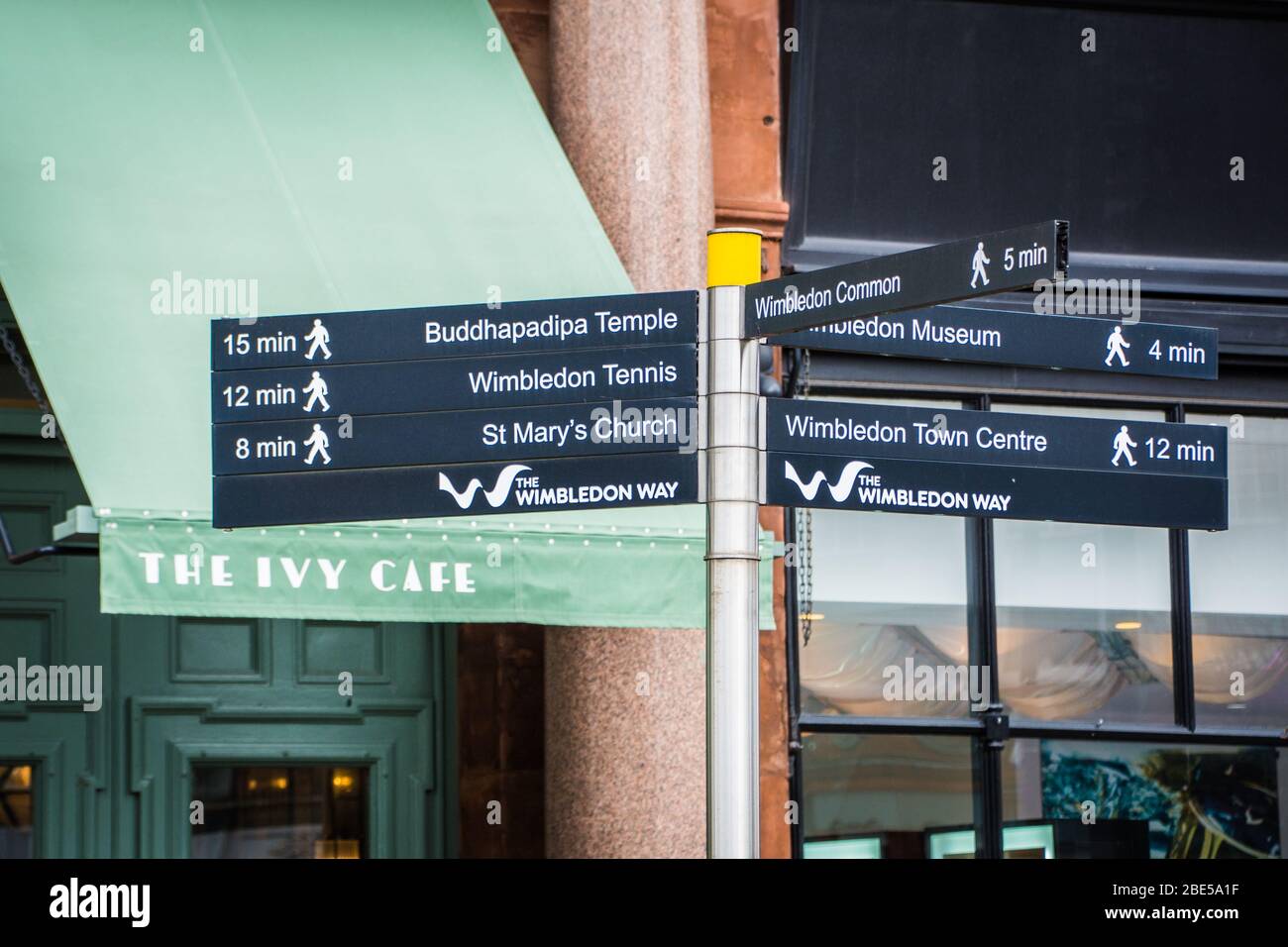 LONDON- MARCH, 2019: Sign post in Wimbledon Village with directions to ...