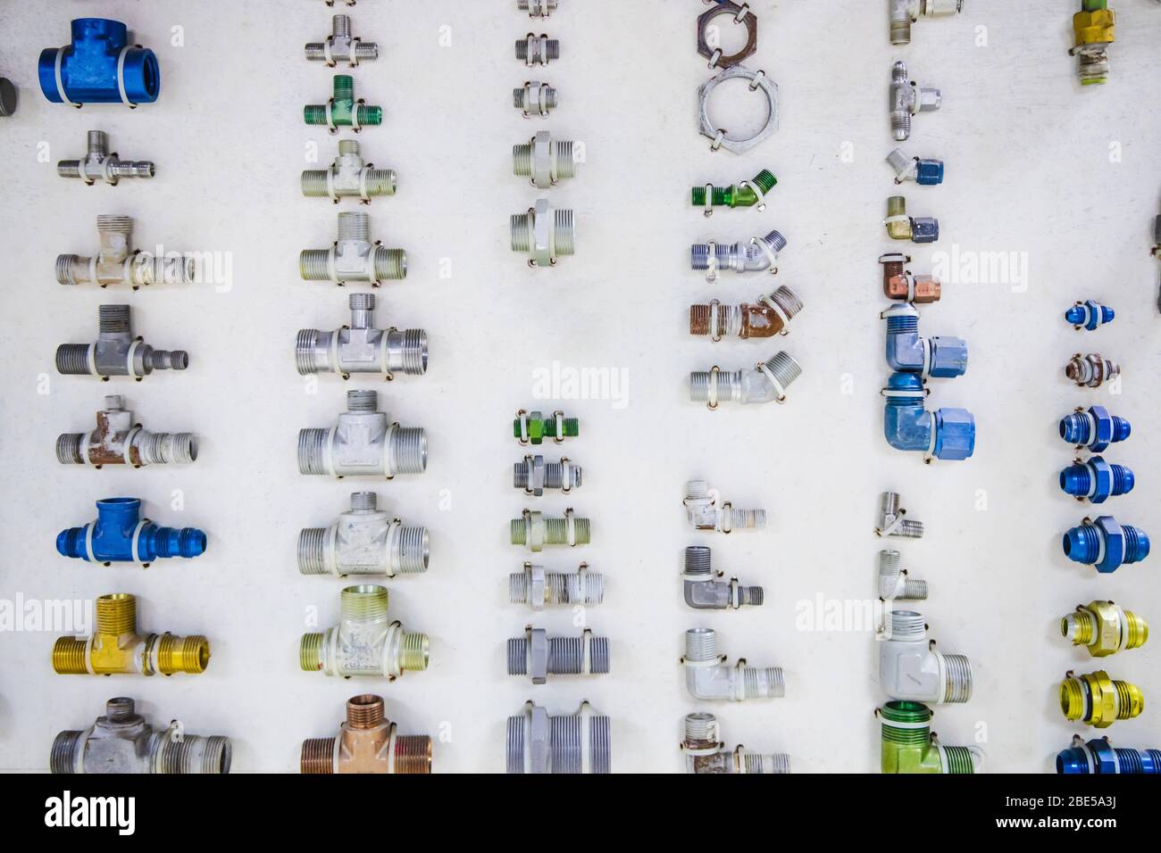 Bunch of colorful pipe junction on display at hardware store Stock ...
