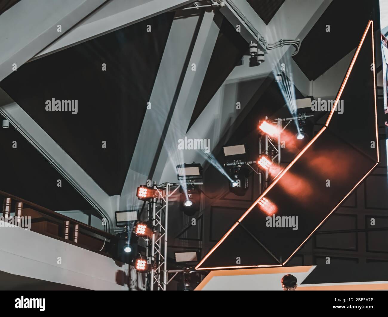 Close up of orange stage spotlight at an E-sport competition event ...
